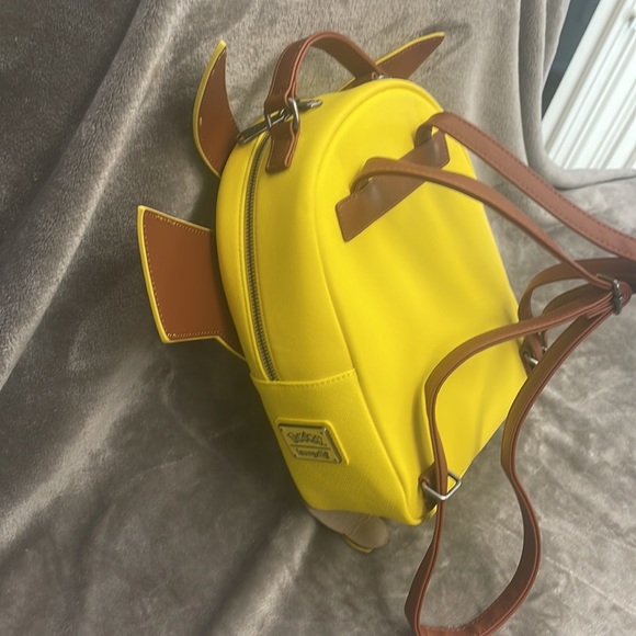 Loungefly | Bags | Loungefly Pokemon Pikachu Yellow Backpack Brand New ...
